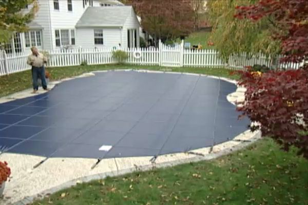How to Install a Pool Cover for Safety • HouseCalls
